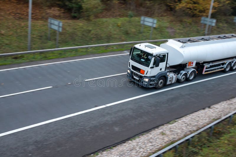 Tanker lorry on the road stock image. Image of cargo - 132295817