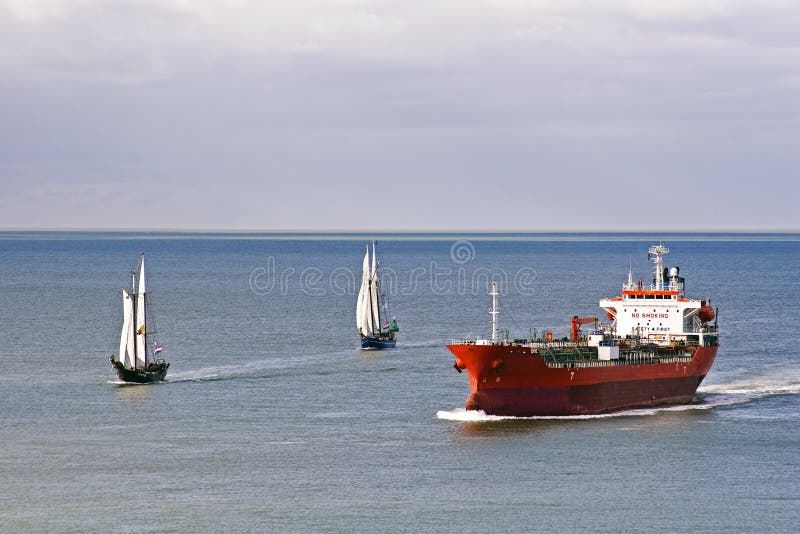A tanker and sailing ships stock photo. Image of relaxed - 12633284