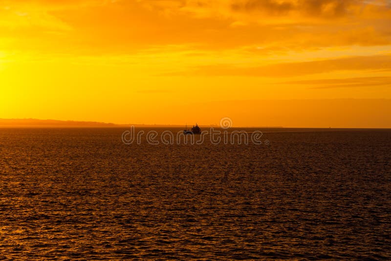 Tanker at Sea in the Sunrise Light Stock Photo - Image of evening, boat ...