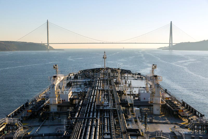 Tanker Ship is Steering Under the Bridge. Stock Image - Image of vessel ...