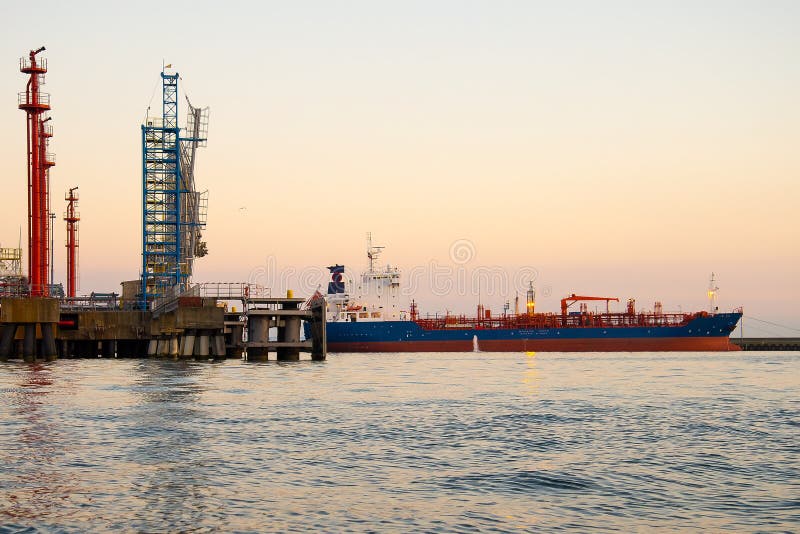 Unloading of a tanker ship stock photo. Image of ship - 56563996