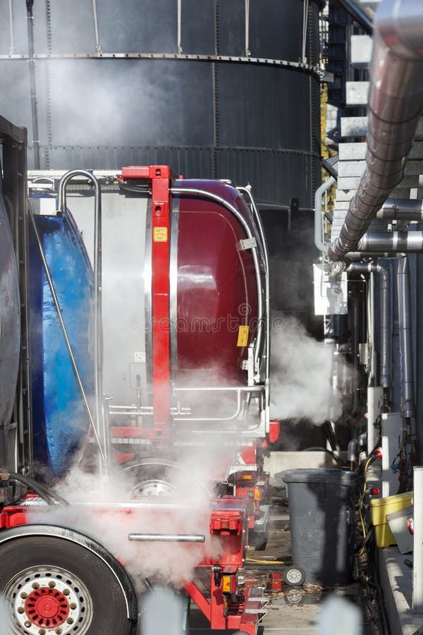 Tankers unloading raw milk stock photo. Image of steam - 80134158