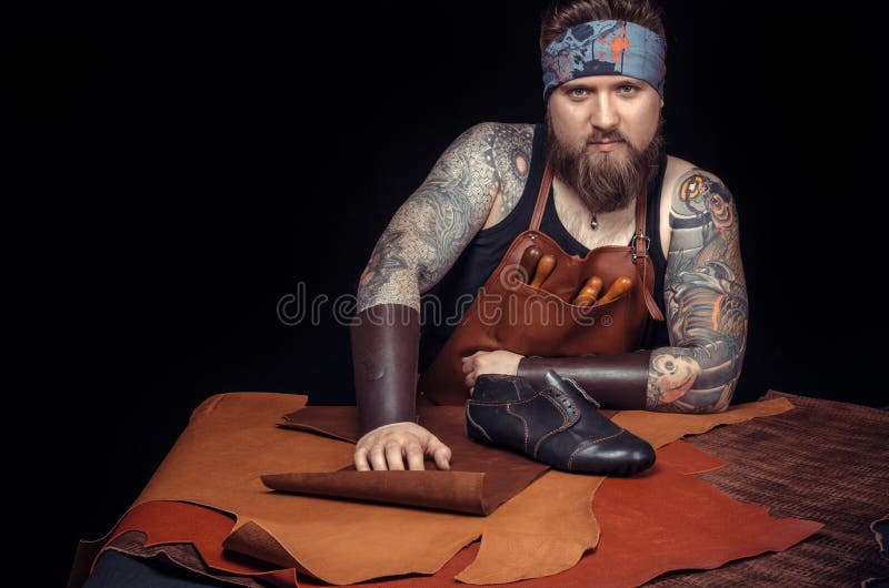 Professional Tanner Working with Leatherwork at the Workplace Stock ...
