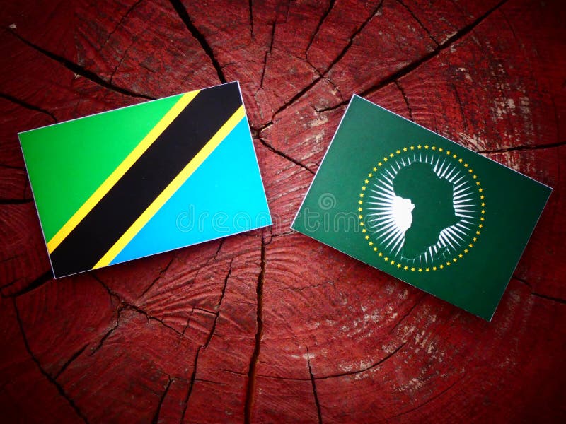 Tanzanian Flag with African Union Flag on a Tree Stump Stock Photo ...