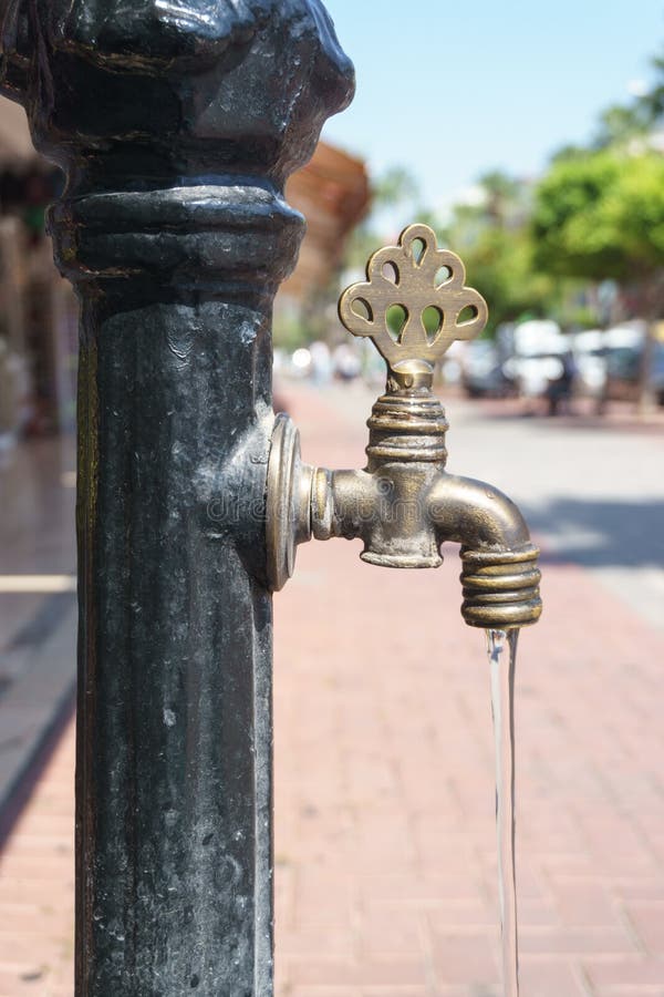 Tap with Drinking Water on the Streets of the City Stock Photo - Image ...