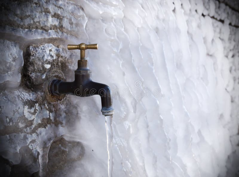 Tap on frozen wall stock image. Image of metal, faucet - 18195979