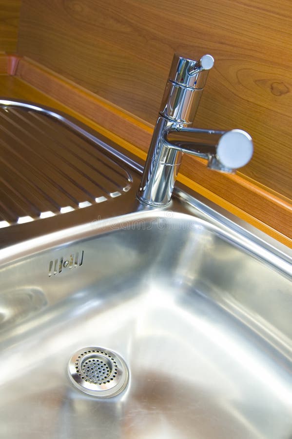 Tap in kitchen stock photo. Image of cabinet, counter - 1072516