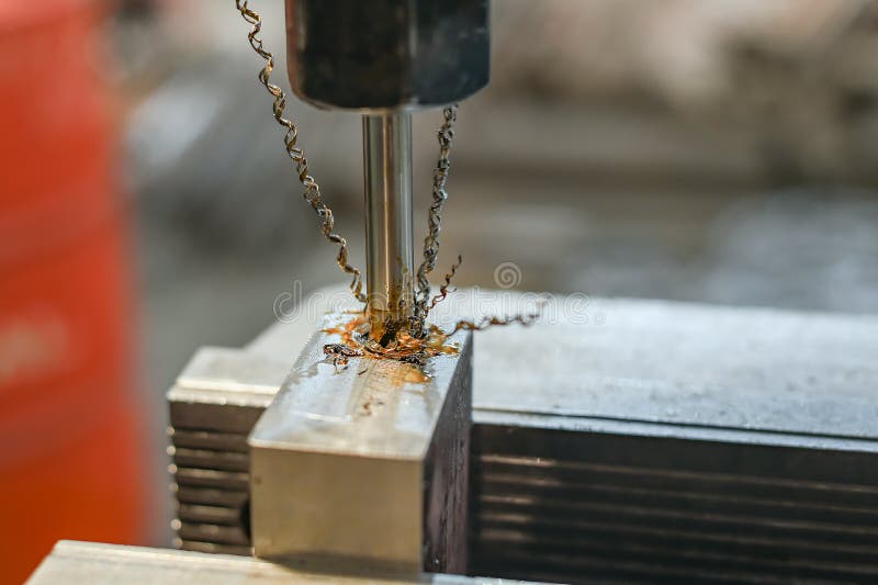 A Tap on a Machine for Tapping a Hole in a Part Stock Photo - Image of ...