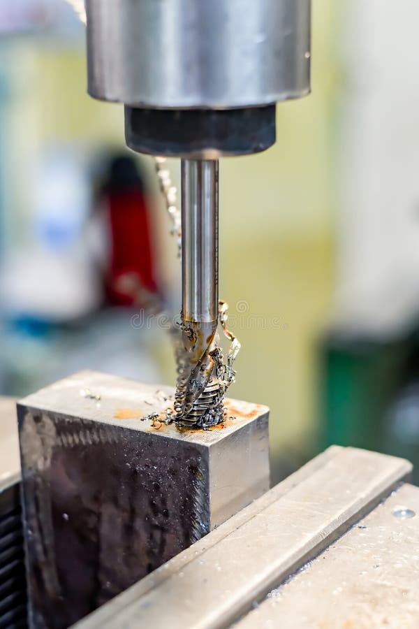 A Tap on a Machine for Tapping a Hole in a Part Stock Photo - Image of ...