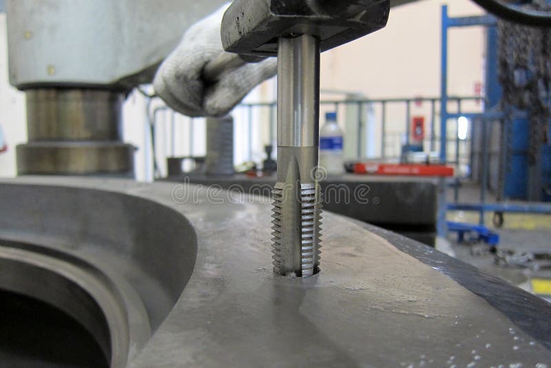 Tapping process stock image. Image of engineering, action - 63456851