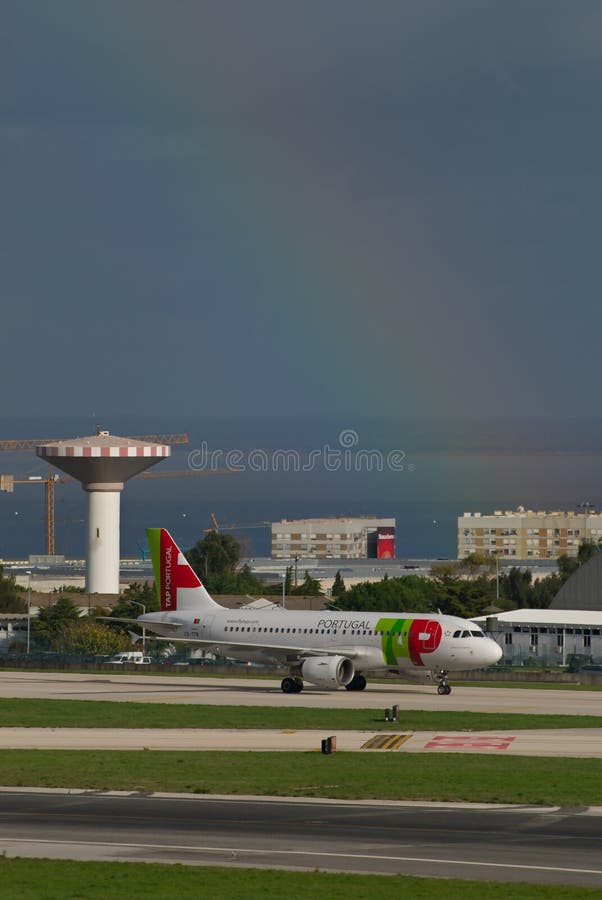 TAP with rainbow editorial photo. Image of airport, company - 20464271