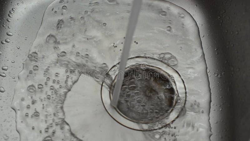 Tap Water Flows Down The Sink Into The Drain Stock Video Video Of