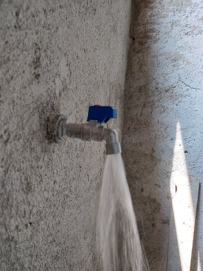 Tap Water on Unfinished Wall Stock Photo - Image of water, wall: 196378500