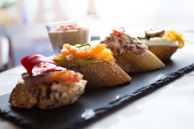 Tapa or Skewer. a Small Slice of Bread on Which a Small Portion of Food ...