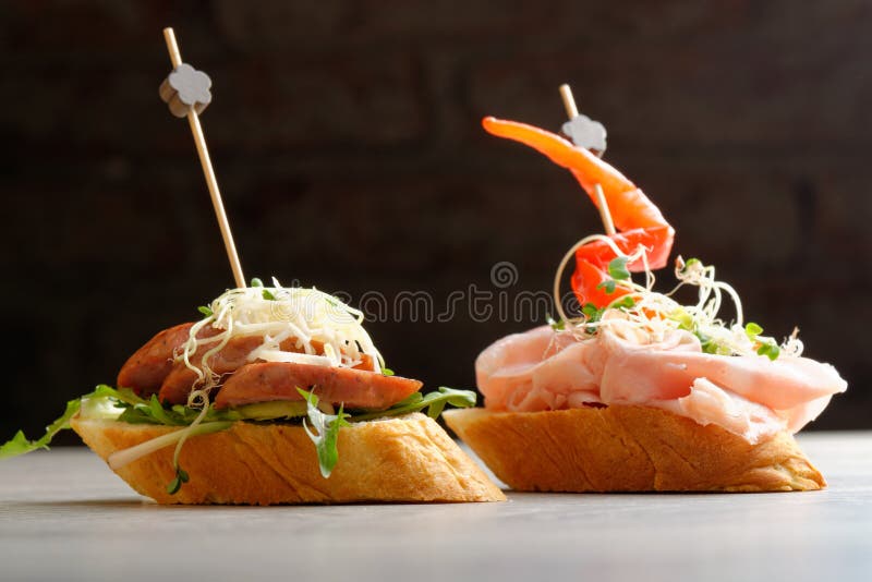 Tapas on Crusty Bread stock photo. Image of olive, garlic - 38756348