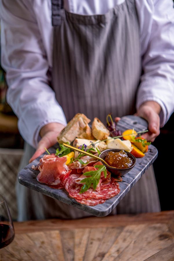 Tapas on Plate in Chefs Hands Stock Image - Image of fast, bruschetta ...