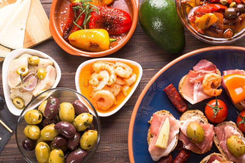 Tapas Starters on Wooden Table Stock Photo - Image of olive, selection ...