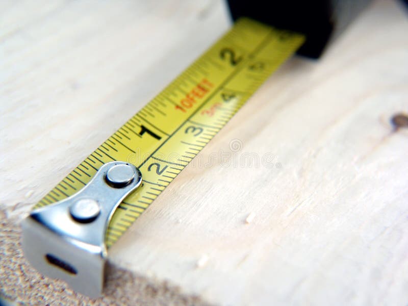 Construction Tape Measure on Carpentry Wood Board Stock Photo - Image ...