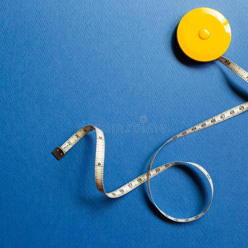 Tape Measure on Blue Background Stock Photo - Image of blue, equipment ...