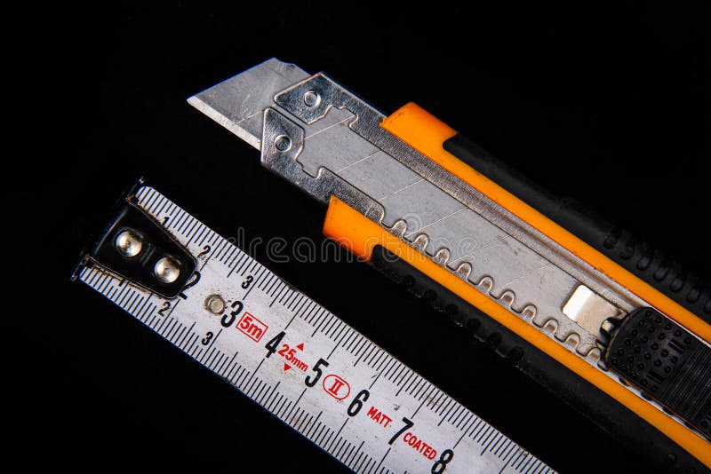 Tape measure and cutter . stock photo. Image of mixture - 190860466