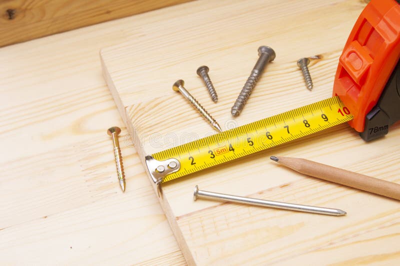 Tape measure laid stock image. Image of board, meter - 57370889