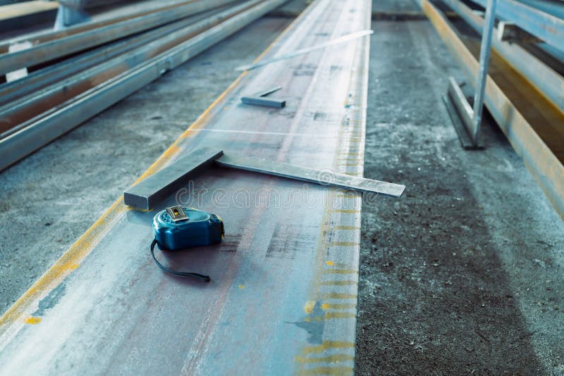 Tape Measure and Metal Corner are on the Metal Part Stock Photo - Image ...