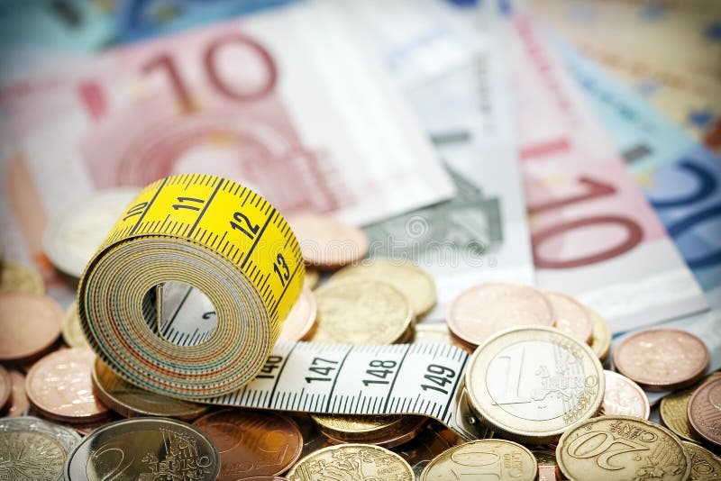 Tape measure around Euros stock photo. Image of measurement - 13249490