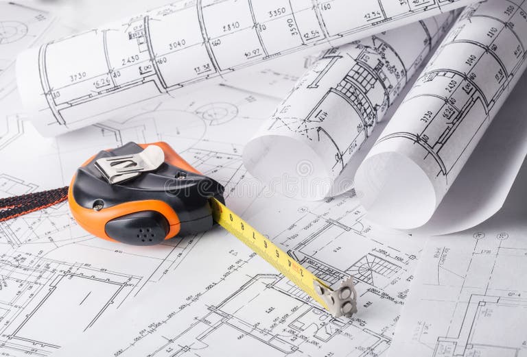 Tape Measure Over a Construction Plan Drawing Stock Image - Image of ...