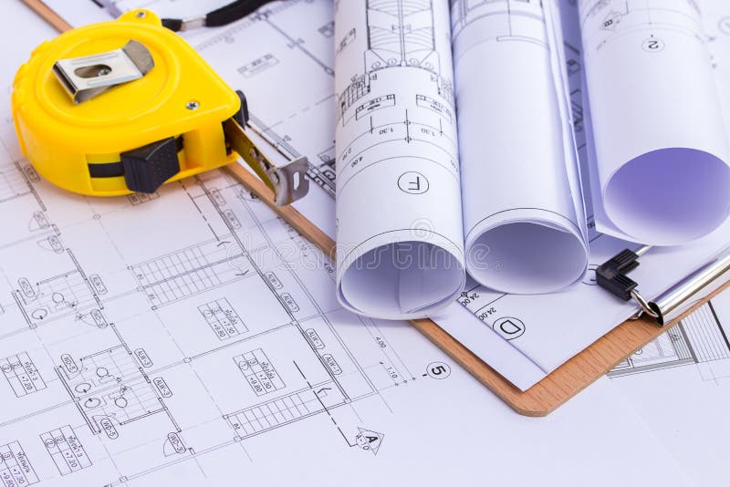 Tape Measure Over a Construction Plan Drawing Stock Image - Image of ...