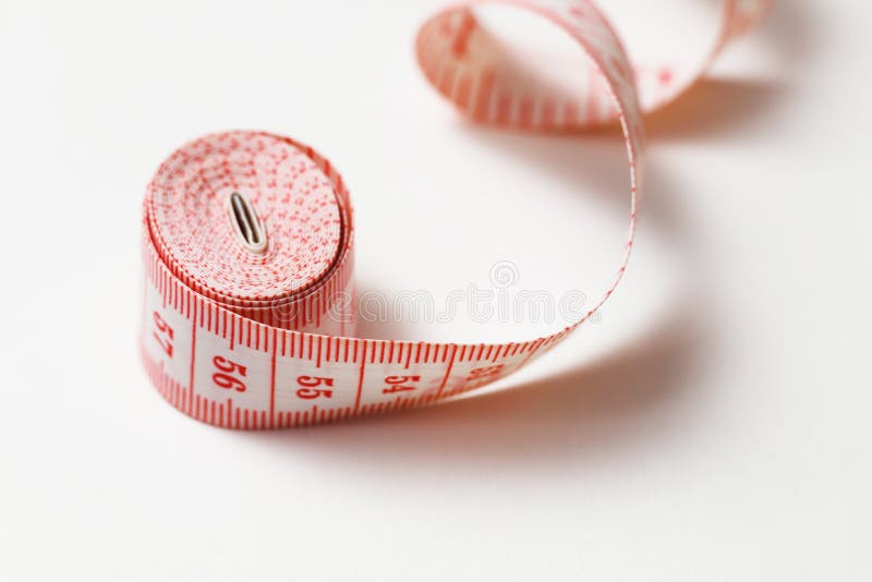 Tape Measure Rolled Isolated on White with Copyspace. Stock Photo ...