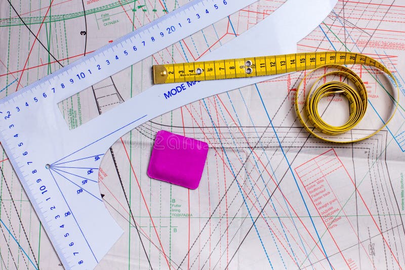 Tape Measure, Ruler and Chalk on a Sewing Pattern Stock Image - Image ...