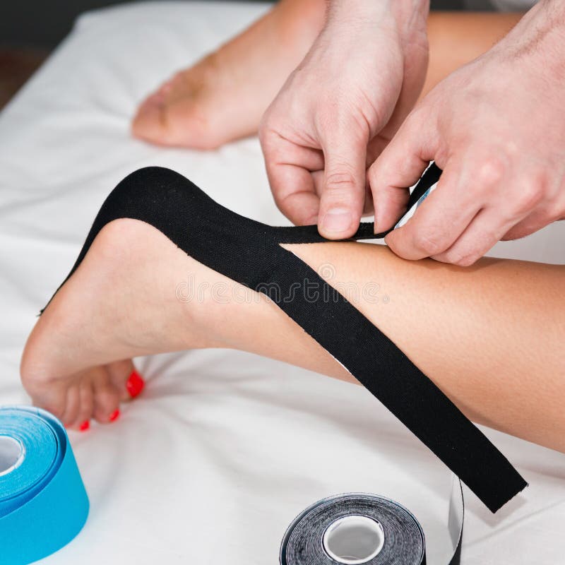 Taping Treatment in Physical Therapy Stock Photo - Image of body, male ...