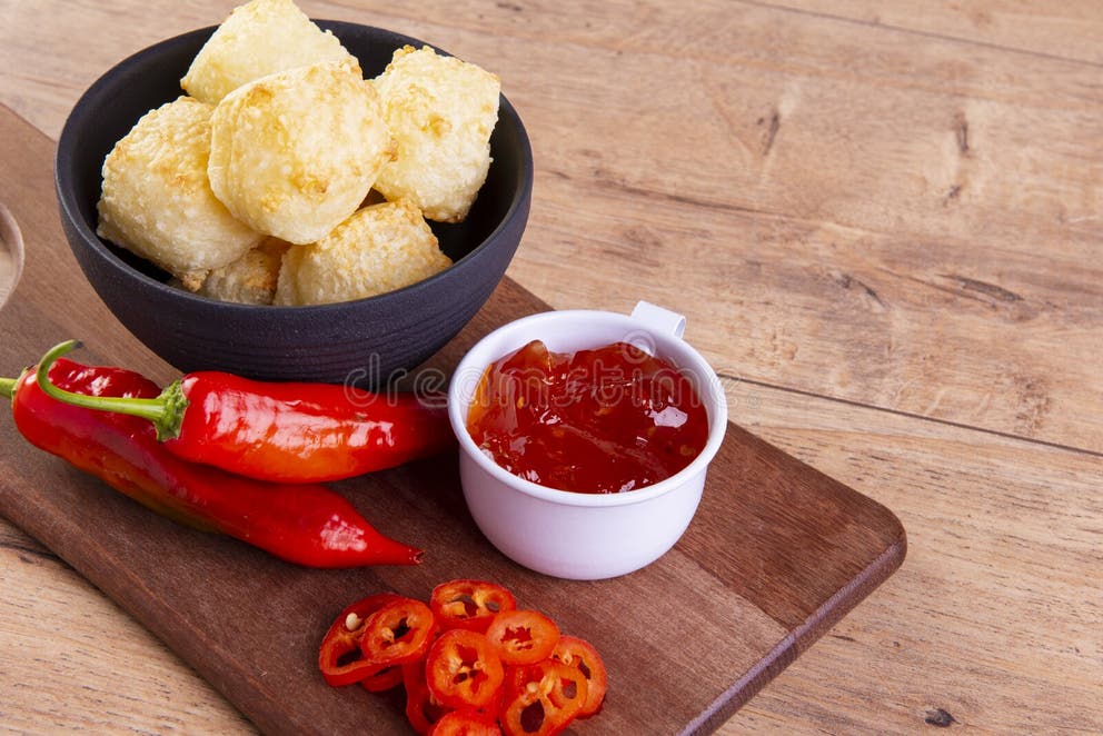 Tapioca Dice Served with Pepper Jelly. Wooden Table Stock Image - Image ...