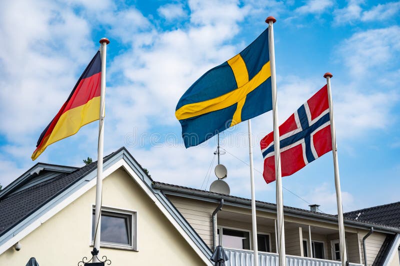 Tappernoje, Denmark - German, Swedish and Danish Flags on a Rooftop ...
