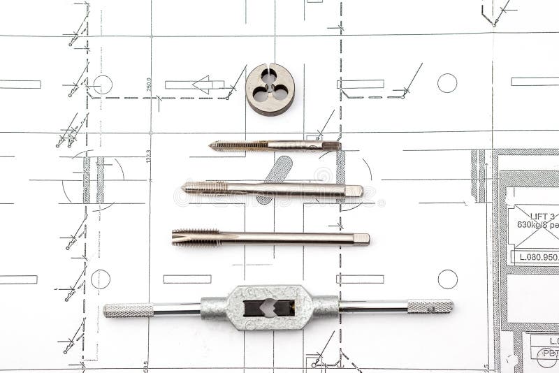 Tapping operation on plan stock image. Image of architecture - 65047943