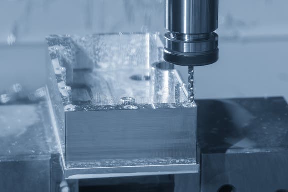 The Tapping Process on CNC Milling Machine in the Light Blue Scene ...