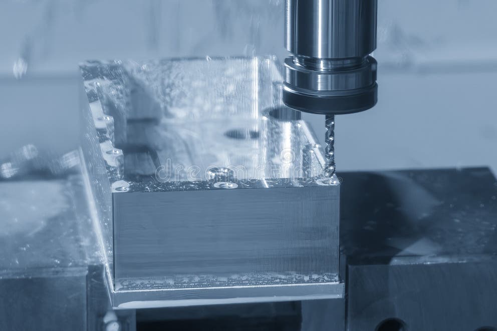 The Tapping Process on CNC Milling Machine in the Light Blue Scene ...