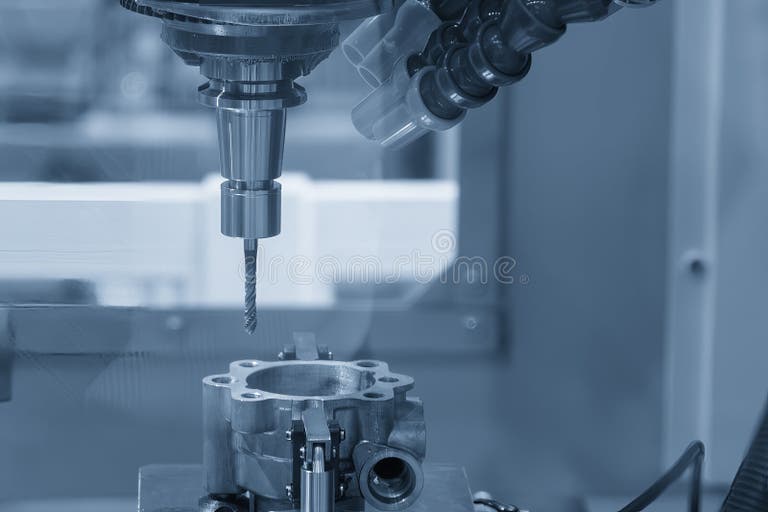 The Tapping Process on CNC Milling Machine in the Light Blue Scene ...