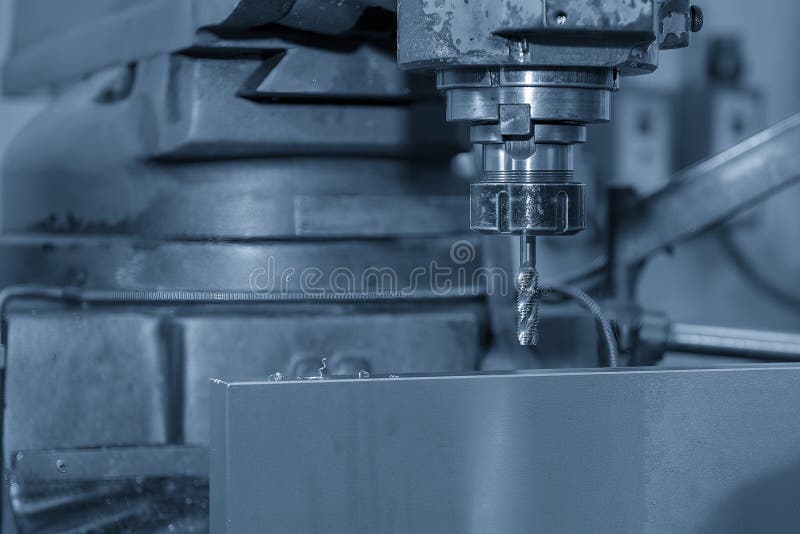 The Tapping Process on NC Milling Machine in the Light Blue Scene Stock ...