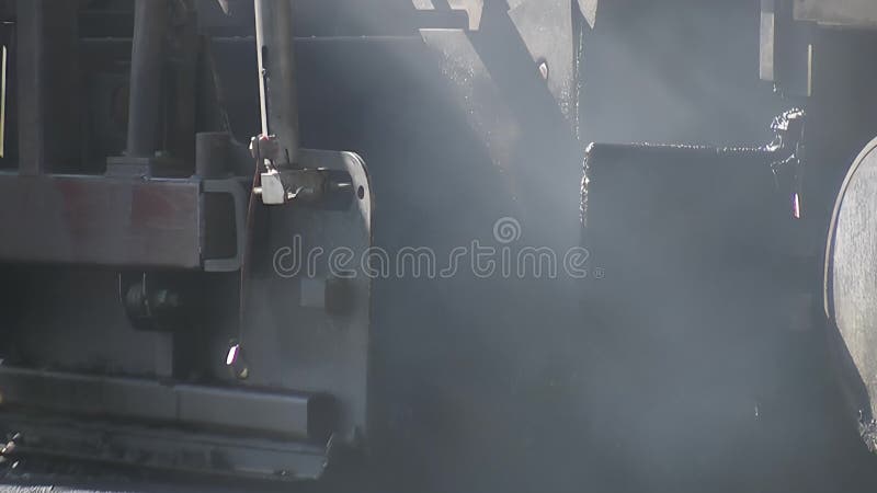 Tar machine tarring a road stock footage. Video of machine - 296993746