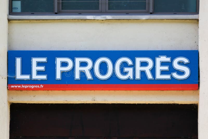Le Progres logo on a wall editorial stock photo. Image of france ...