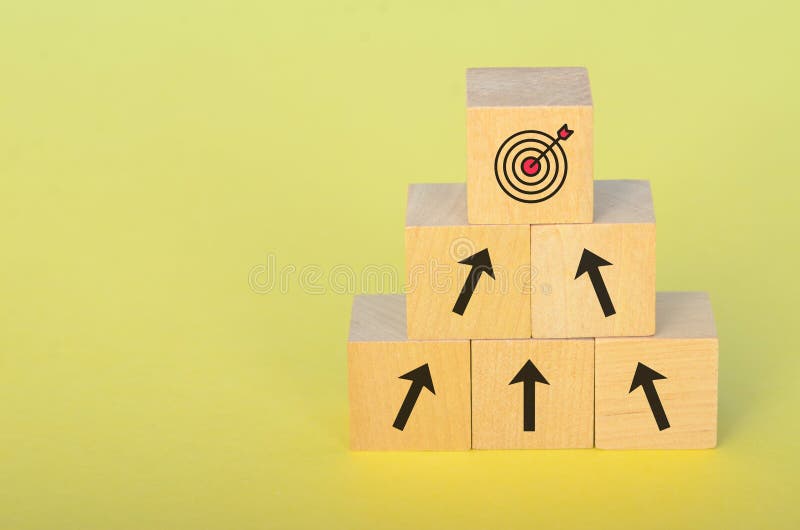 Target Achieved: Arrow Hitting the Center of the Bullseye Stock ...