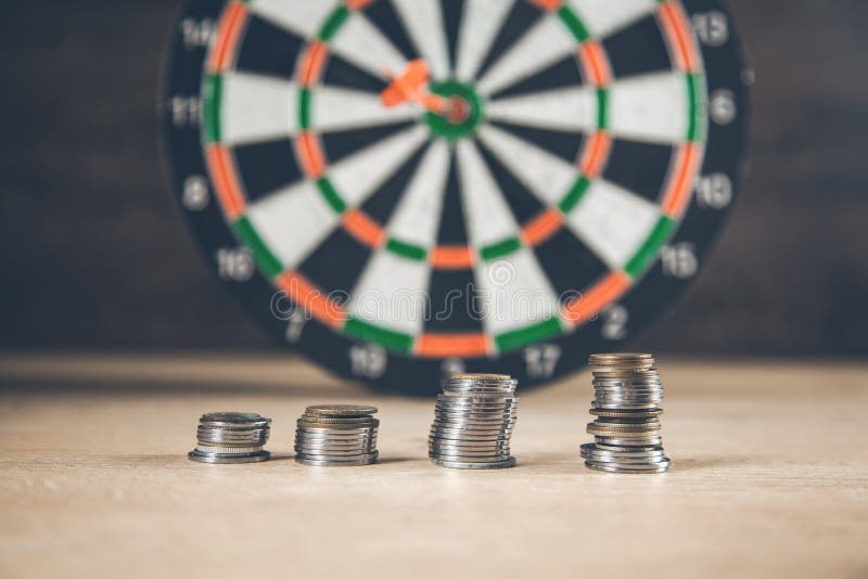 Target board with coins stock photo. Image of finance - 212681880