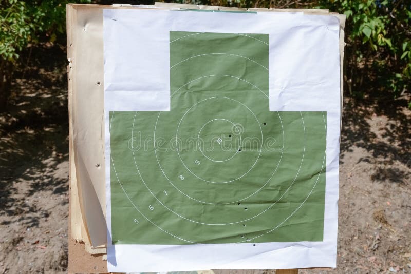 Target with Bullet Holes on the Shooting Range Stock Image - Image of ...