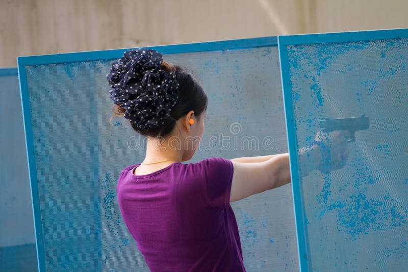 Target Practicing with Gun in the Shooting Range Stock Image - Image of ...