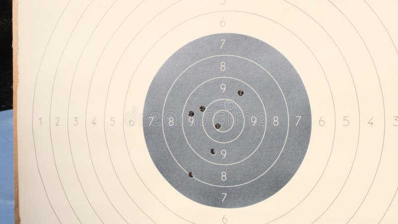The Target for Shooting is Pierced by Bullets in the Shooting Range ...