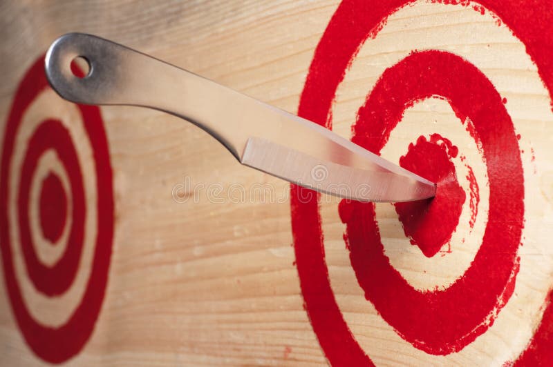 Target and throwing knife. stock image. Image of color - 13640873