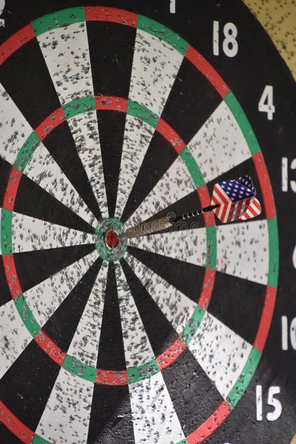 Targeted Dart in the Center Bullseye of a Board Stock Photo - Image of ...