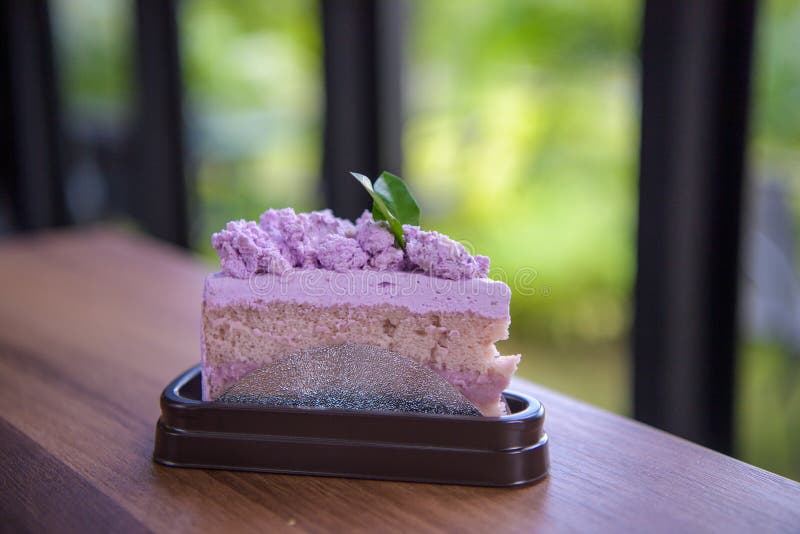 Taro Cake in cafe stock photo. Image of cake, pastry - 199760278