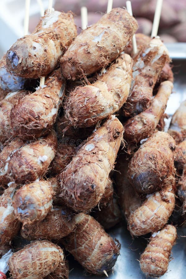 Taro Cooked Skewers on the Market. Stock Image - Image of organic ...